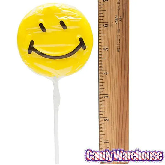 Yellow Smiley Face Lollipops: 60-Piece Case | Candy Warehouse